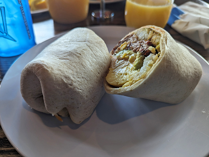 Breakfast burritos reimagined—cut open to reveal a perfect marriage of eggs and fillings that'll make your morning infinitely better.