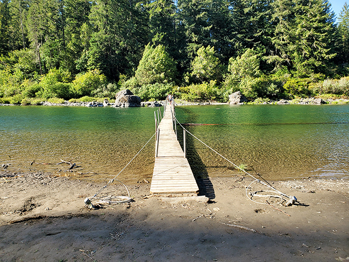 This humble footbridge promises adventure on the other side. Like all good crossings in life, it's about the journey and what awaits.