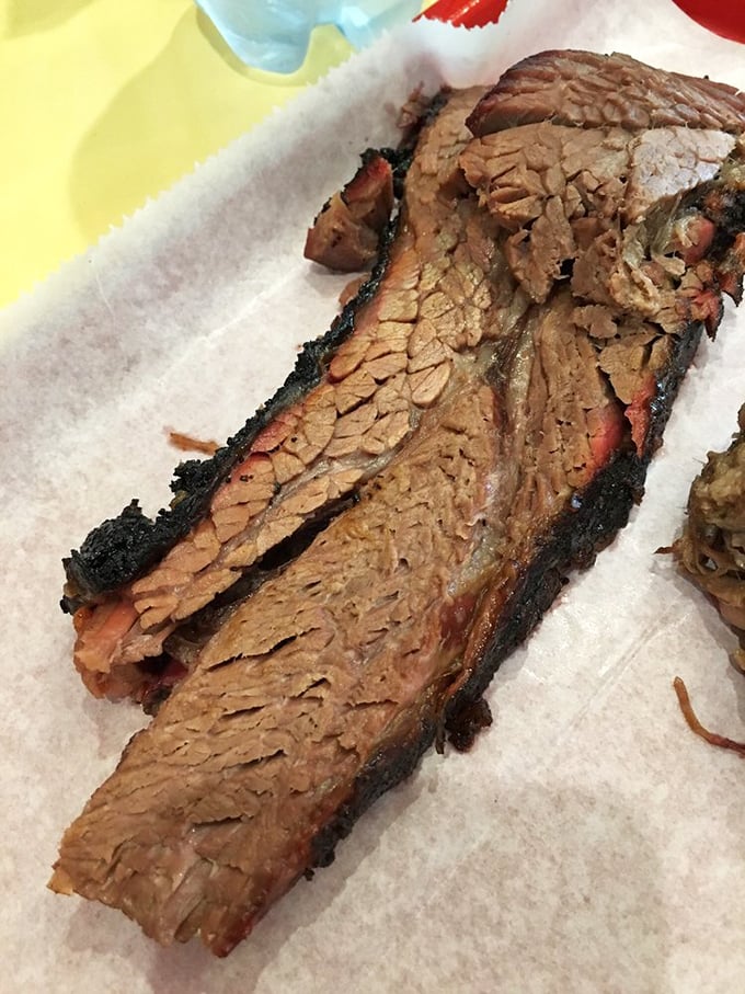 Brisket with that perfect bark and pink smoke ring&mdash;the holy grail of BBQ that makes Texans nod in respectful approval.
