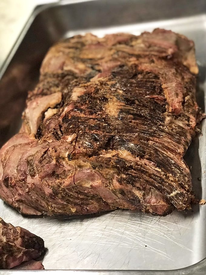 Brisket with a bark so beautiful it belongs in a barbecue museum. That smoke ring is the halo every pitmaster dreams about.