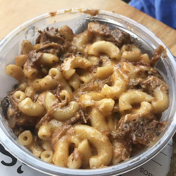 Mac and cheese that doesn't know whether it's comfort food or a religious experience. The brisket chunks aren't just toppings &ndash; they're co-stars.