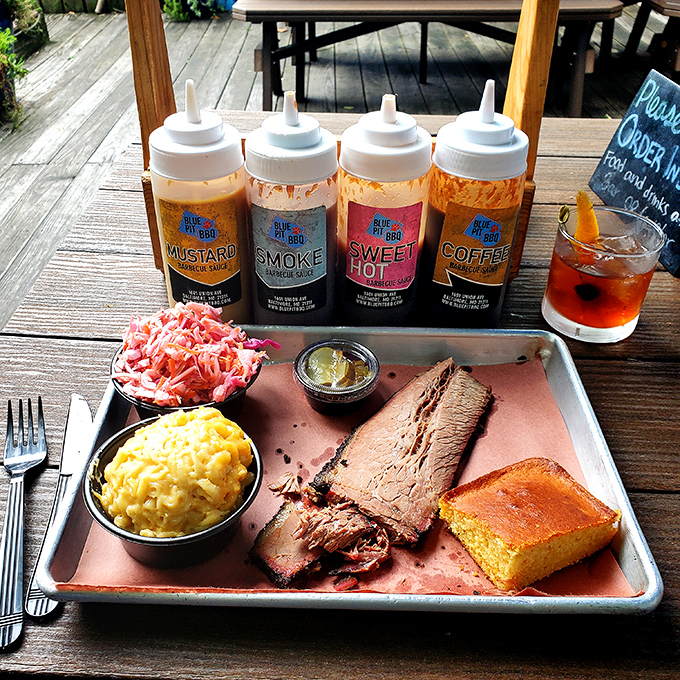 A barbecue plate that belongs in the Louvre—brisket with perfect bark, mac and cheese that's achieved creamy nirvana, and slaw that cuts through the richness.