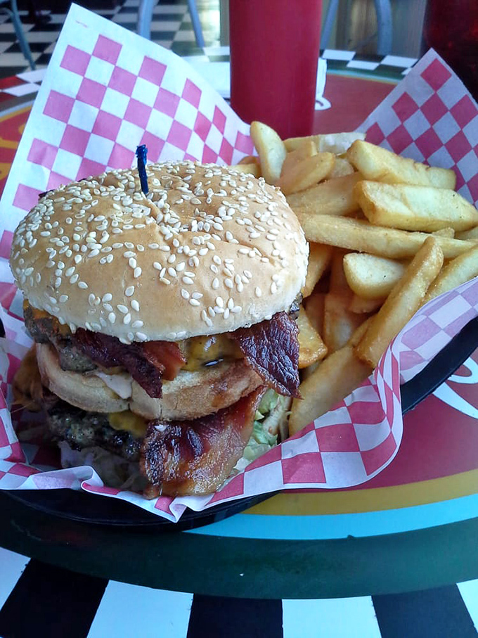 Behold the burger that launched a thousand road trips. That sesame-studded bun barely containing its beefy treasure is Washington's edible landmark.
