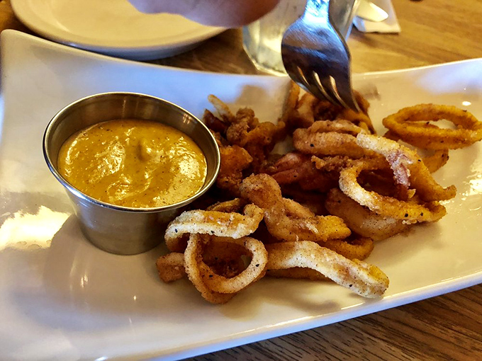 Calamari so perfectly fried, even people who say "I don't eat tentacles" will be reaching across the table. That dipping sauce deserves a Grammy for Best Supporting Role.