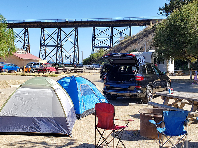 Camping with a view that beats any five-star hotel. The trestle frames your morning coffee spot like industrial-chic d&eacute;cor for Mother Nature.