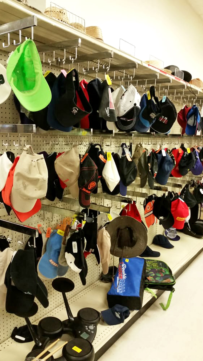 Hat paradise! From neon green baseball caps to weathered fishing hats, your next head-topper is hanging among this colorful collection of cranial fashion.