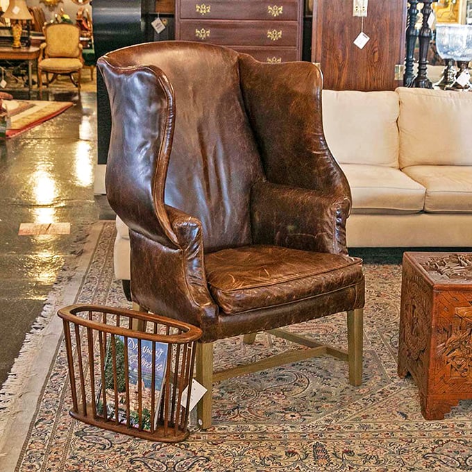 The leather wingback chair that silently judges your book choices while simultaneously offering the perfect reading nook. Patina that only decades can perfect.