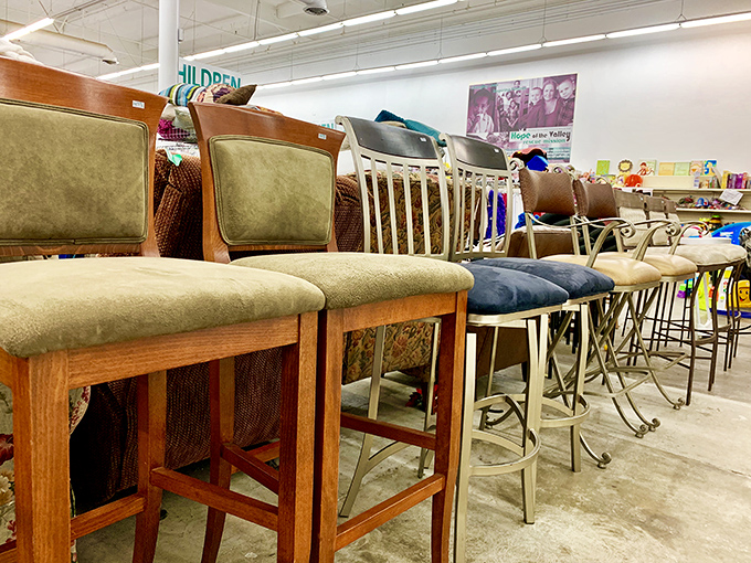 Bar stools lined up like eager contestants on a game show, each one raising its hand saying, "Pick me for your kitchen island!"