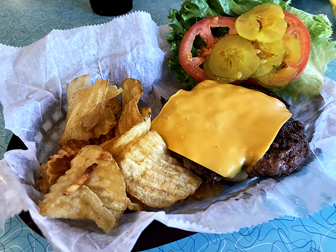 The star of the show&mdash;a cheeseburger that doesn't need height or gimmicks to achieve greatness. Those house-made chips aren't just sidekicks; they're co-stars.