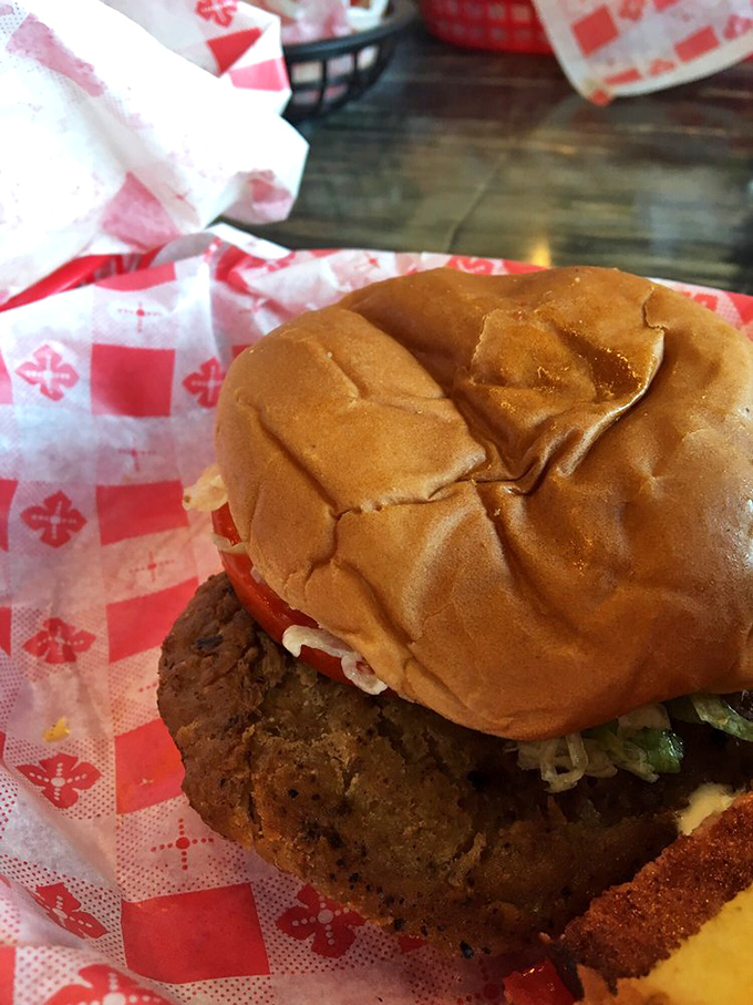 This isn't just a burger&mdash;it's architectural perfection between buns, where every layer plays its part in the symphony of flavors.