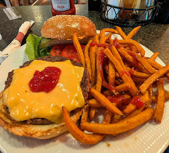 The cheeseburger that launched a thousand cravings &ndash; melty American cheese, a perfectly seasoned patty, and sweet potato fries worth fighting for.