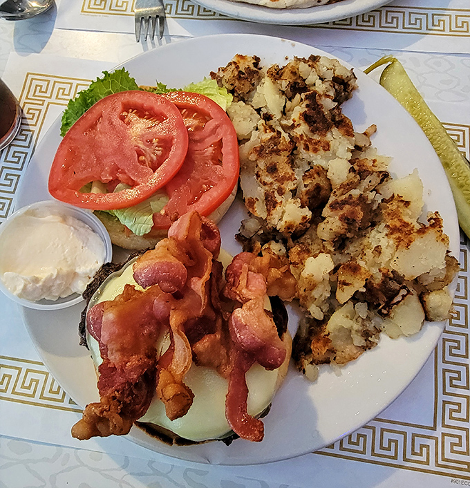 The burger arrives with crispy hash browns and thick-cut tomatoes &ndash; a trio that's performed together longer than The Rolling Stones and with better reviews.