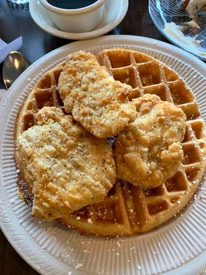 Chicken and waffles: where Southern comfort meets Midwest hospitality. That golden waffle is practically begging for its maple syrup bath.