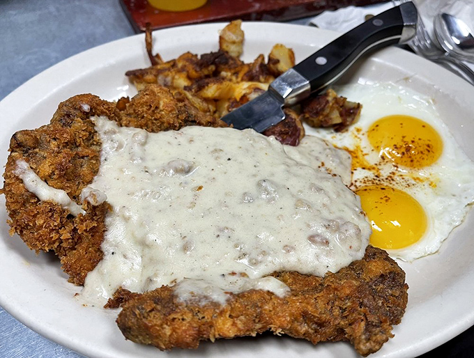 Chicken fried steak done right: crispy, tender, and generous enough to share (but why would you?).