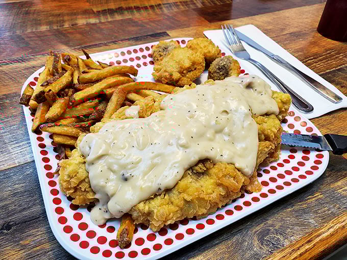 When chicken fried steak comes smothered in this much country gravy, you know someone in the kitchen truly loves you. Diet starts tomorrow.