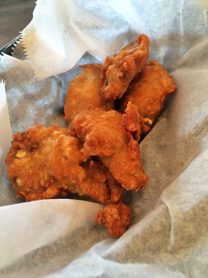 These crispy chicken wings aren't just fried&mdash;they're transformed into crunchy vessels of joy. The kind that make you forget table manners exist.