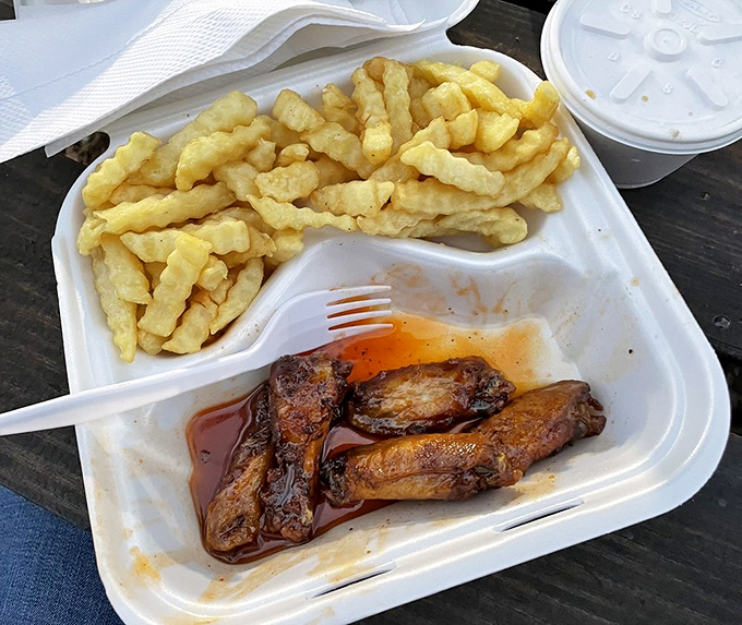 These wings aren't playing second fiddle to anyone. Crispy, saucy, and served with crinkle-cut fries&mdash;comfort food that speaks a universal language.