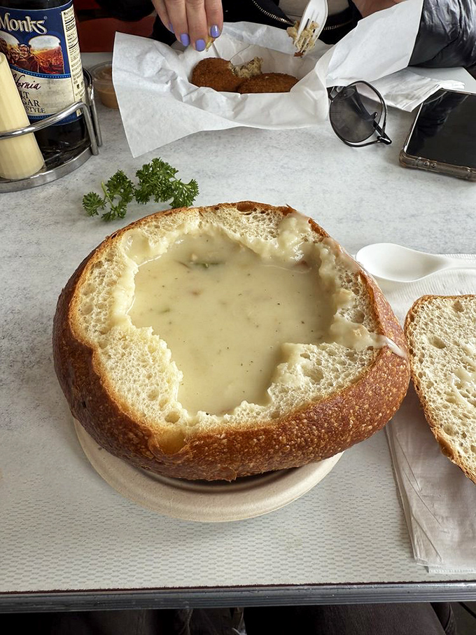 A sourdough bread bowl transforms ordinary chowder into an edible masterpiece that would make any New Englander weep with joy.