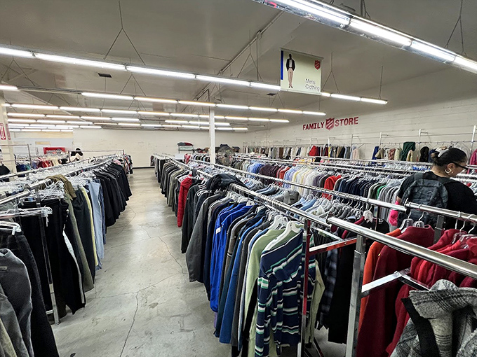 The clothing section stretches toward infinity, a color-coded highway of possibilities where yesterday's fashion becomes tomorrow's signature look.