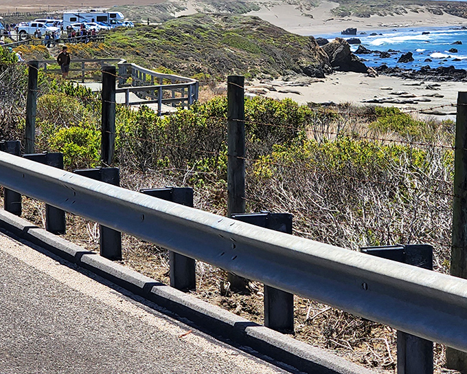 The highway's guardrail offers a front-row seat to nature's greatest show &ndash; the endless dance between land and sea.