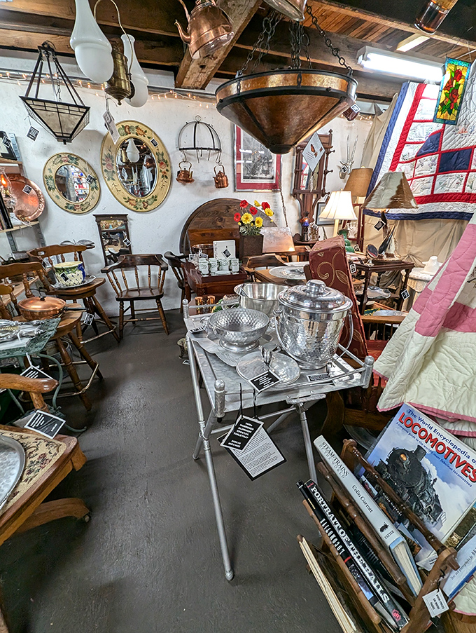 Copper pots and vintage mirrors create a warm, nostalgic glow. I half-expected to find a portal to Narnia behind that gorgeous wooden wardrobe.