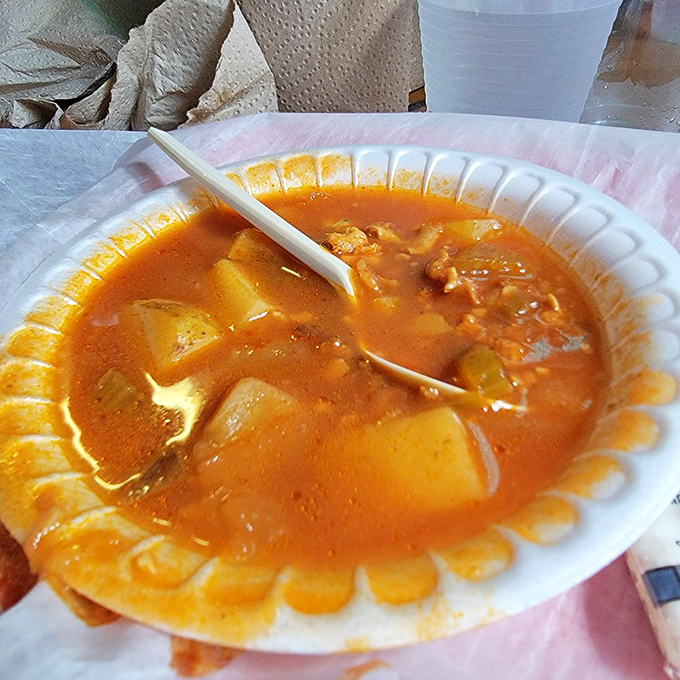 This conch chowder isn't just soup; it's a warm, spicy hug in a bowl that tastes like the ocean decided to throw a party.