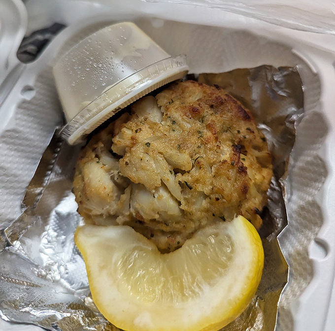The holy grail of Maryland cuisine&mdash;a perfect crab cake that's all meat, minimal filler, and maximum flavor. That golden crust deserves its own fan club.