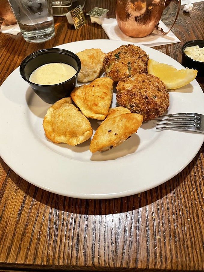 The star attraction: crab cakes so packed with sweet lump meat, they barely need the breadcrumbs to hold together. Seafood alchemy at its finest.