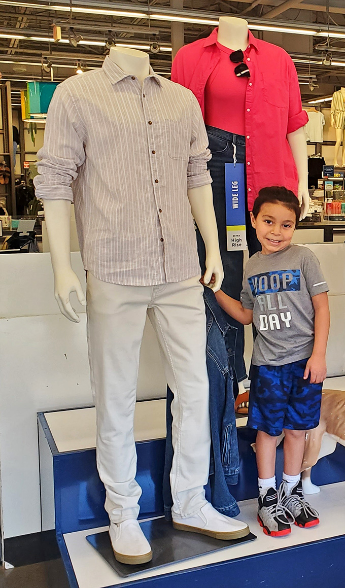 When the mannequins tower over you, it's either a very tall display or shopping has become wonderfully surreal.