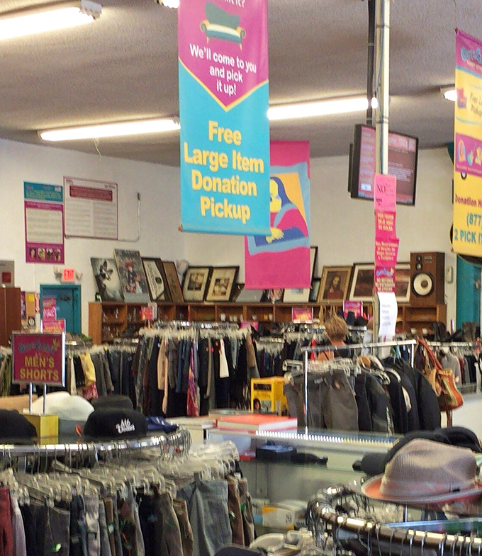 Circular racks filled with potential, each hanger a question: "Could this be your new signature piece?"