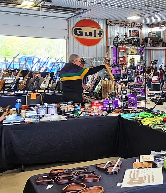 Vintage signs and musical instruments create a time-travel experience in this indoor stall. That Gulf sign alone would look perfect in any garage!