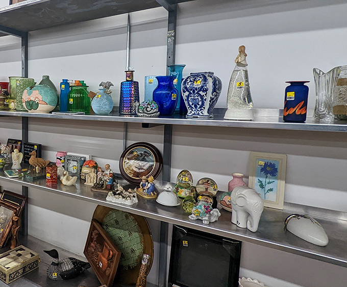 This shelf of decorative knickknacks tells a thousand stories&mdash;each vase and figurine once graced someone else's mantelpiece.