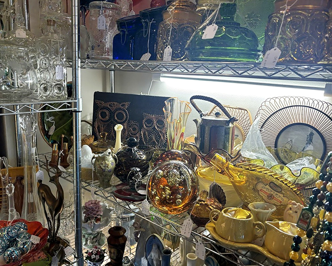 The glass menagerie! From delicate figurines to bold colored vessels, each shelf offers a glimpse into the artistic sensibilities of decades past.