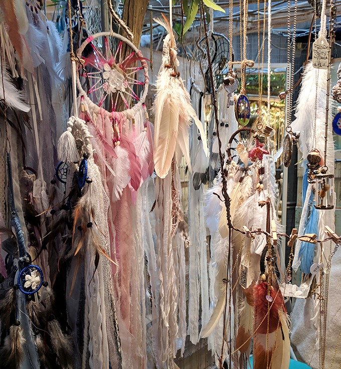 Dreamcatchers and feathered creations dangle like bohemian chandeliers, promising to filter out bad dreams and boring décor choices.