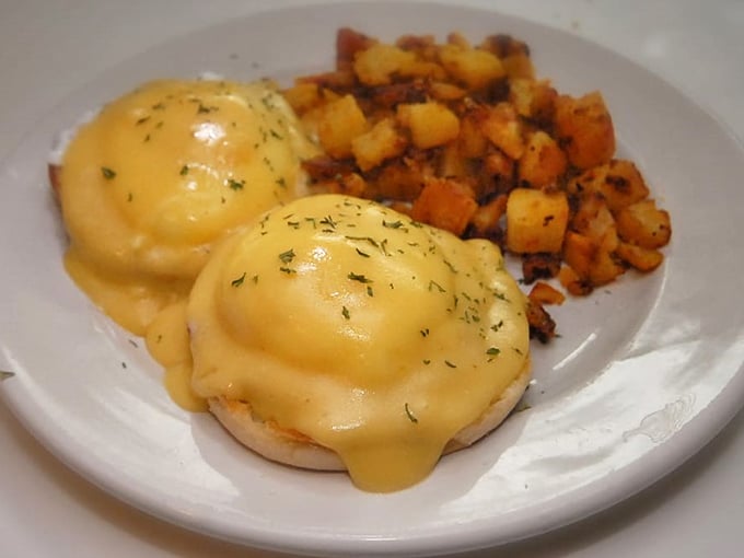 Eggs Benedict that would make royalty jealous. That hollandaise sauce cascading down like a golden waterfall deserves its own Vermont postcard.