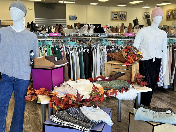 Mannequins showing off seasonal styles with autumn flair. Like a fashion runway you can actually afford, these displays offer inspiration without intimidation.