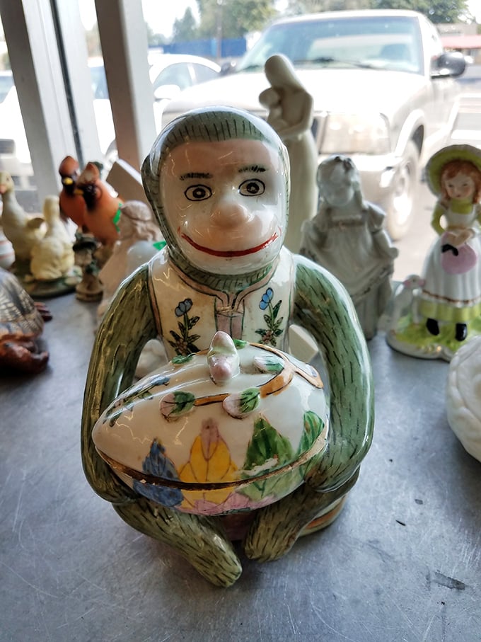 This ceramic monkey figurine is either nightmare fuel or the conversation piece your mantel desperately needs. In thrift store logic, it could be both.