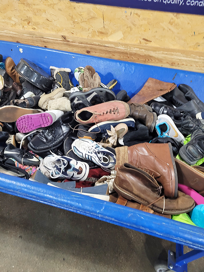 The footwear bin &ndash; where single boots seek their mates and vintage leather hides among modern synthetics. Shoe enthusiasts develop an almost supernatural scanning ability here.