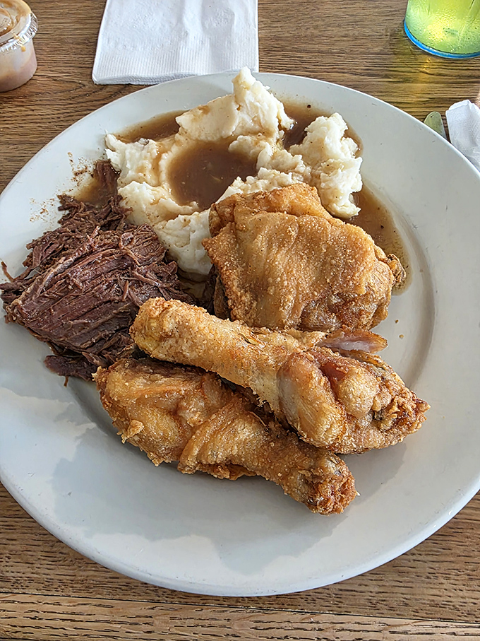 The holy trinity of comfort food: golden fried chicken, fork-tender roast beef, and cloud-like mashed potatoes. Diet plans, beware—resistance is futile.