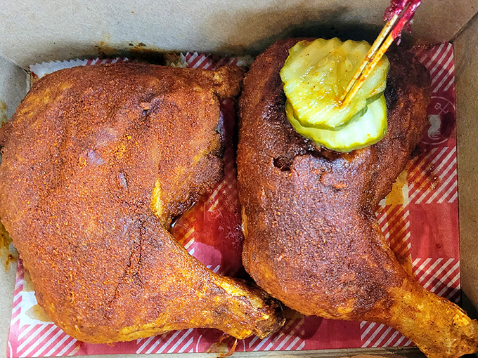 Two pieces of perfectly spiced dark meat chicken with that signature pickle on top&mdash;like a crown jewel on edible royalty.