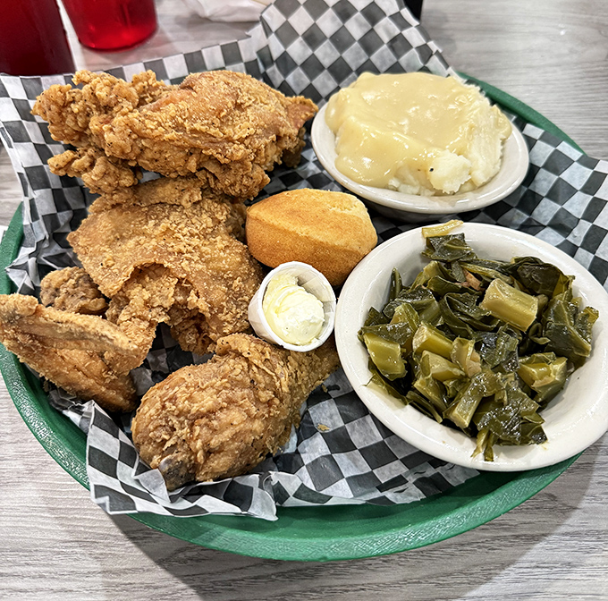 Fried chicken that makes you understand why people willingly cross state lines for a meal. Those sides aren't just accompaniments&mdash;they're co-stars.