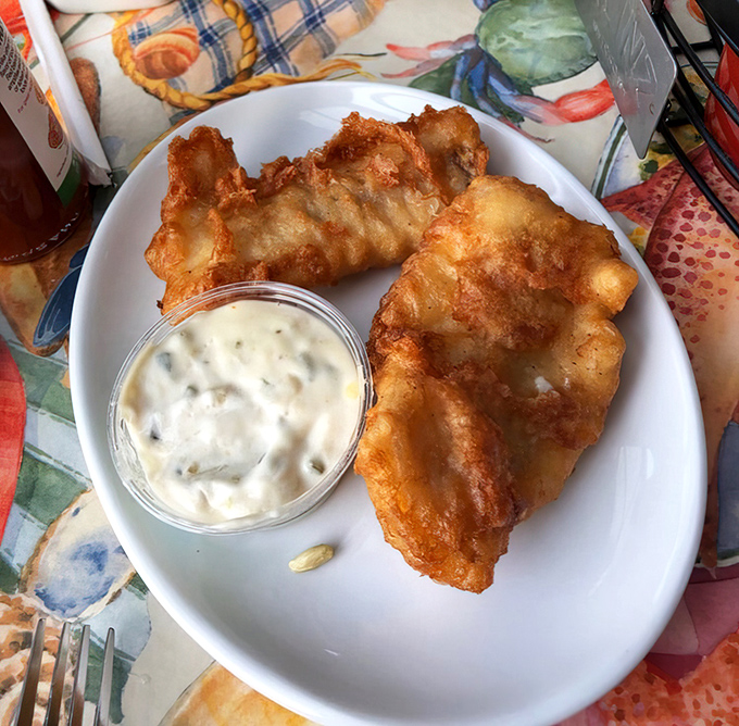 Golden-battered fish that shatters with each bite, paired with house-made tartar sauce. This isn't fast food fish&mdash;it's seafood that respects its origins.