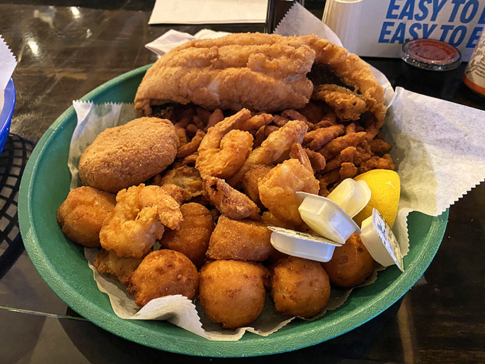 This fried seafood feast comes piled high on a platter that practically requires an engineering degree to navigate, but what a delicious problem to have.