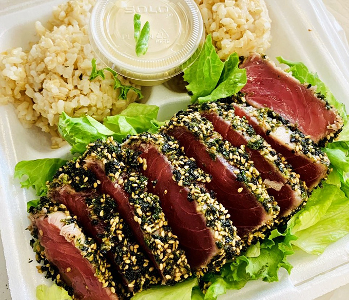 The furikake seared ahi is what would happen if traditional Japanese technique went on vacation and came back with a tan.