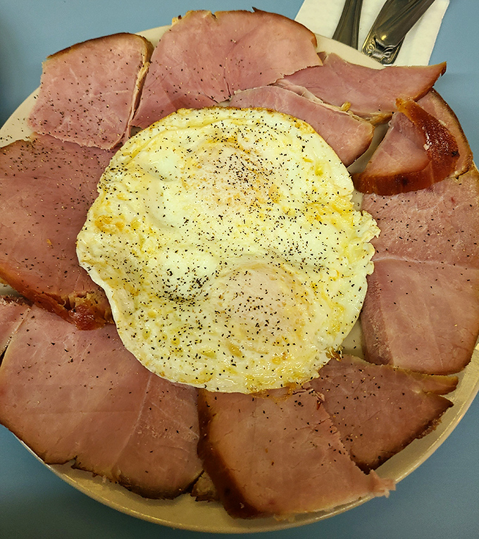 The ham and egg plate that launched a thousand workdays. Perfectly cooked sunny-side up surrounded by a pink porcine halo of Detroit's finest ham.