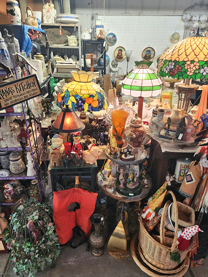 Tiffany-style lamps illuminate a wonderland of nostalgia. Each shelf holds potential heirlooms waiting for their "once upon a time" to begin again.