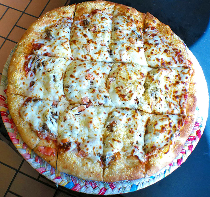 Pizza perfection isn't about fancy toppings or artisanal crusts&mdash;it's about that perfect cheese pull that stretches across the table like a dairy rainbow.