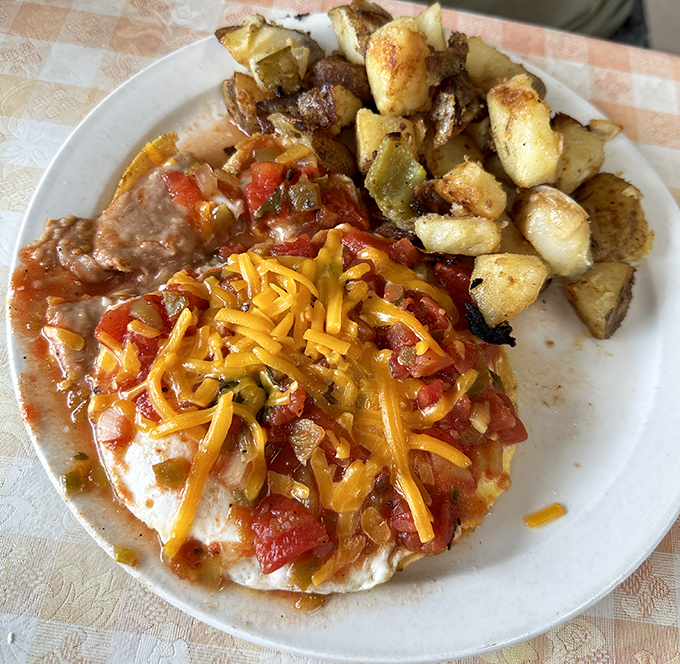Southwest breakfast artistry at its finest&mdash;crispy potatoes, melted cheese, and a fiesta of flavors that would make your abuela proud.
