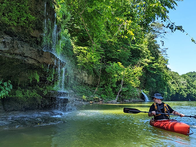 Kayaking beneath gentle cascades &ndash; where "getting your feet wet" takes on an entirely new, more adventurous meaning.
