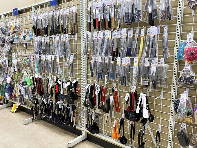 Kitchen utensils hang like culinary possibilities, each spatula and serving spoon waiting to complete someone's drawer of "things I didn't know I needed."